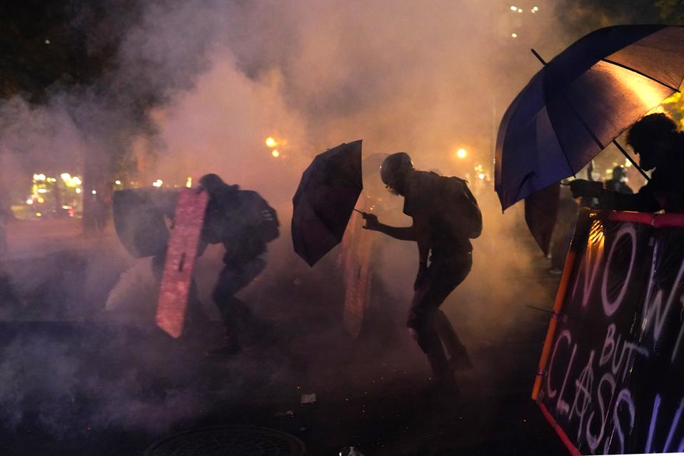 Photos: Violence Subsides After Feds Exit Portland Protests