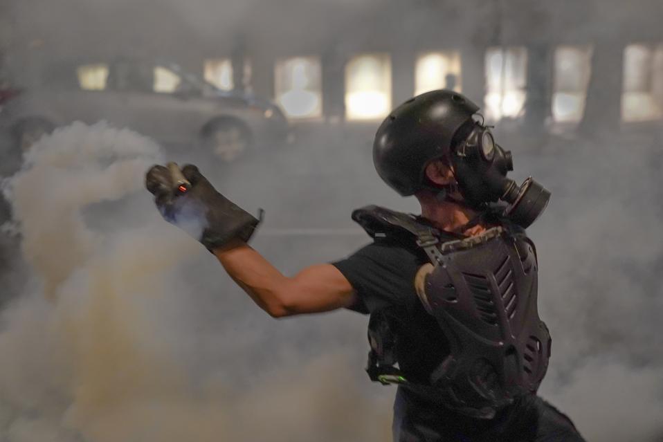 Photos: Violence Subsides After Feds Exit Portland Protests