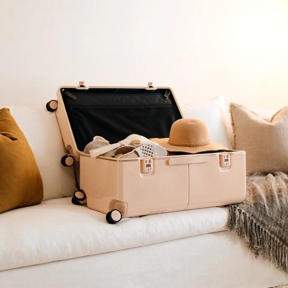 July Sits At The Intersection Of Fashionable And Functionable Luggage