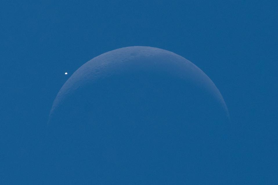 In Photos: Watch Venus Eclipsed By The Moon In Rare Sky Event