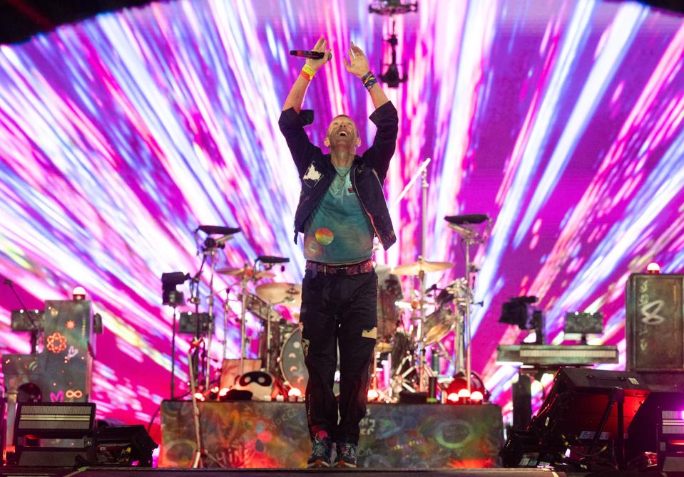 Glastonbury: Coldplay Go Pyro; Crowe, Cruise And McQuarrie ‘Dad-Rave’