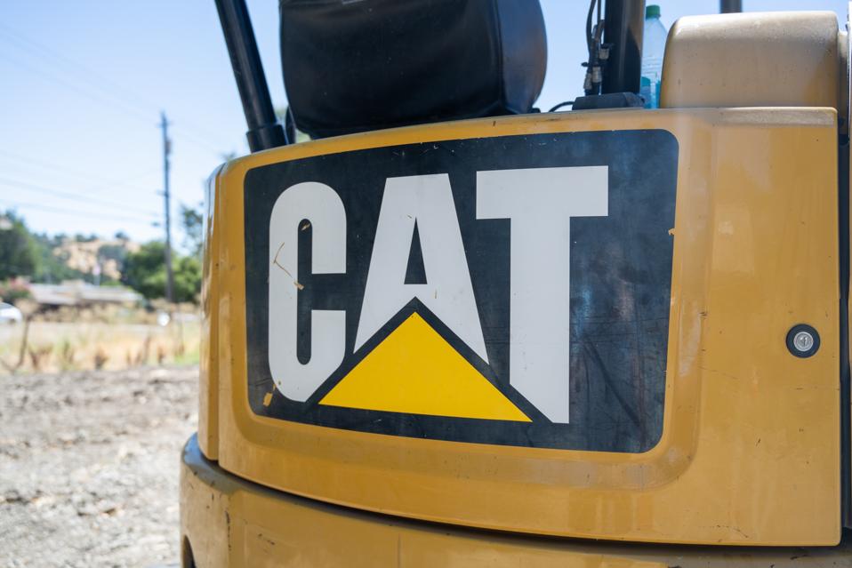 Which Industrial Sector Heavyweight Looks Better: Deere Or Caterpillar?