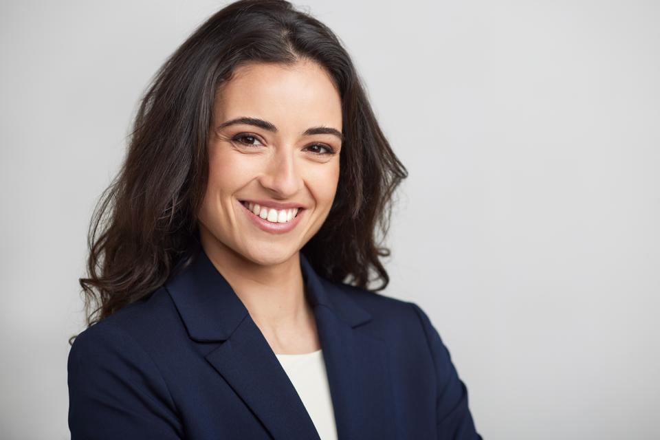 Should You Smile In Your Profile Photo? Here’s What Research Shows